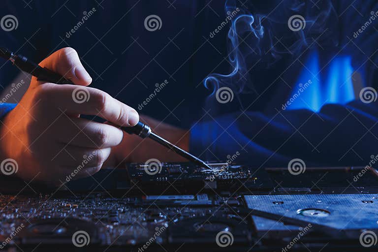 Computer Hardware Engineering. Developer Soldering Electronic Component ...