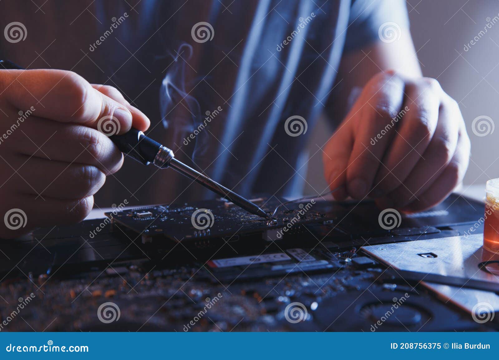 Computer Hardware Engineering. Developer Soldering Electronic Component ...