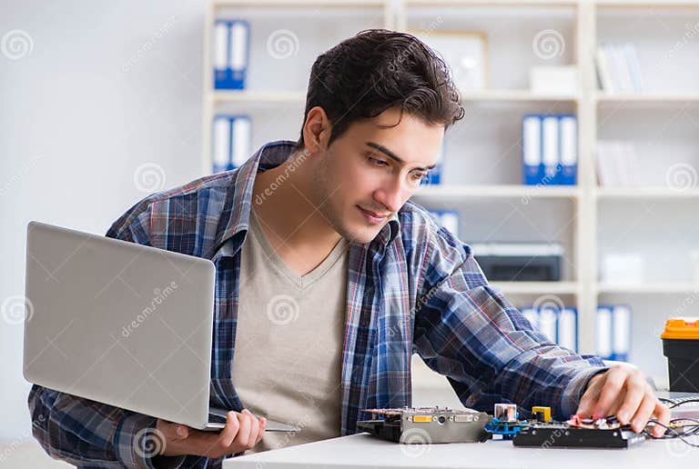 Computer Hardware Repair and Fixing Concept by Experienced Techn Stock ...