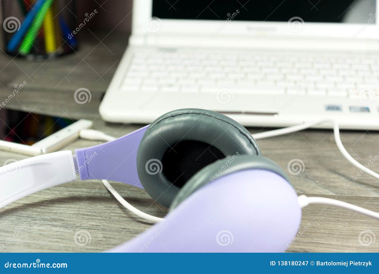 A Computer and the Headphones Stock Image - Image of playlist, music ...