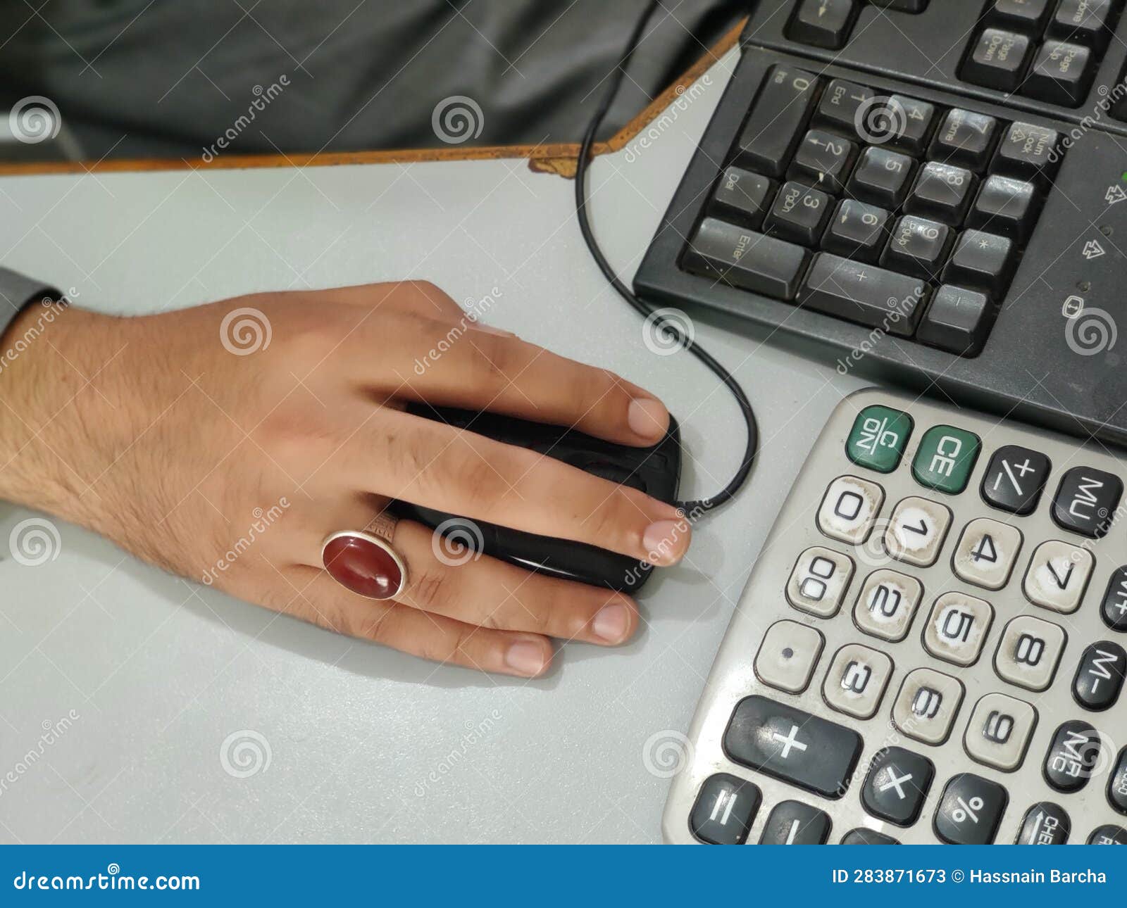 Computer Keyboard, Calculator on Table, Man Hand on Computer Mouse ...