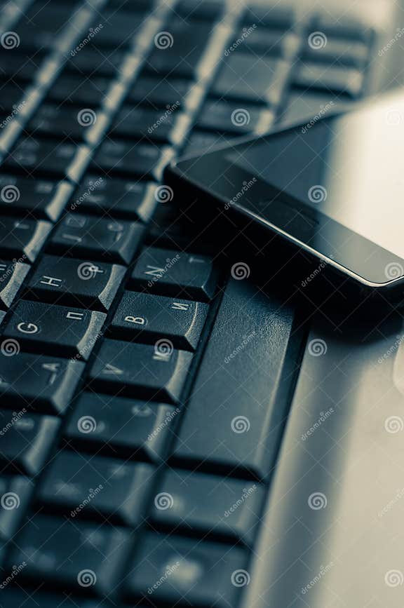 Computer Keyboard and Cellphone in a Beautiful Stock Photo - Image of ...