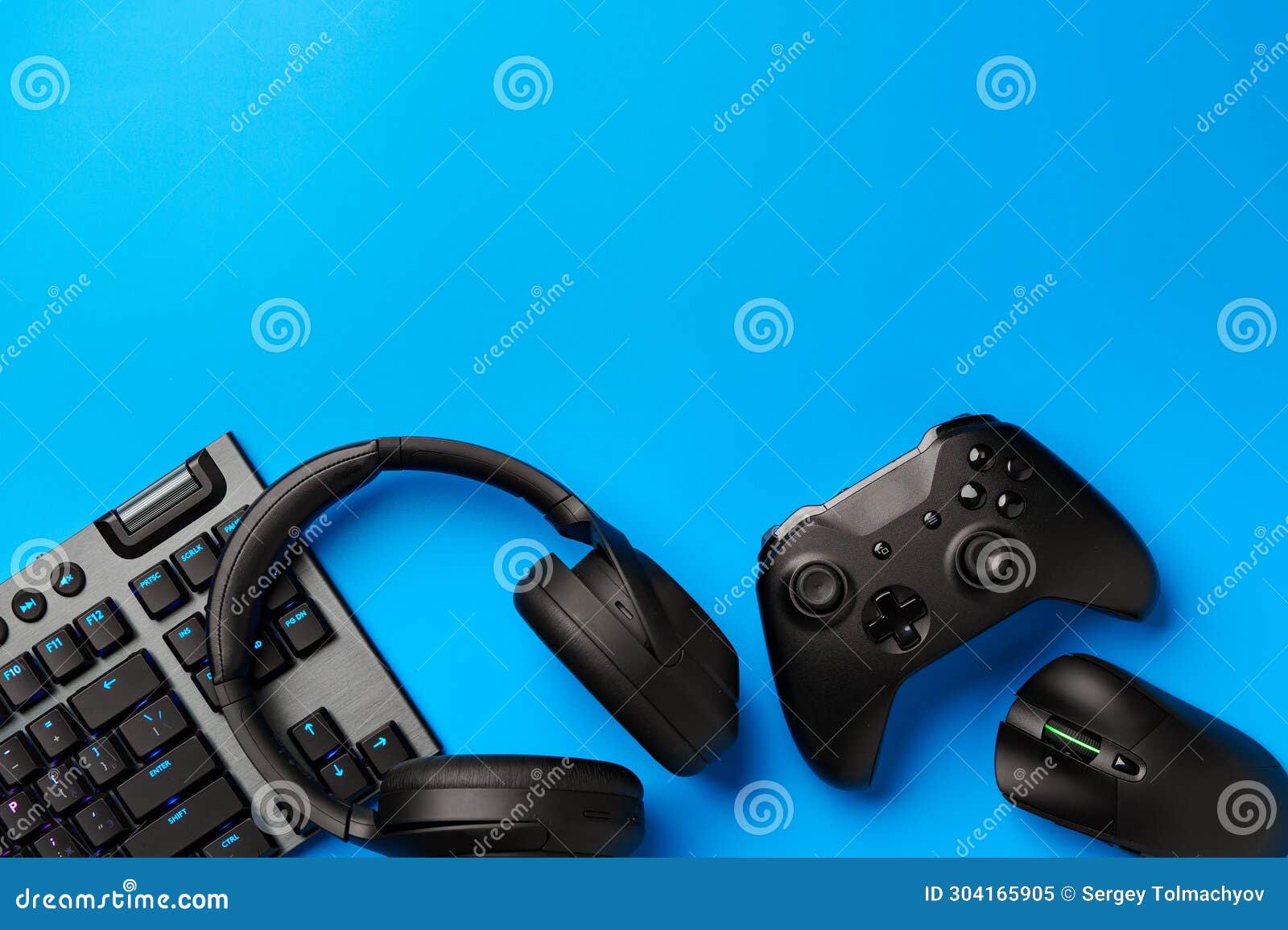 Computer Keyboard and Joystick on Blue Background Top View Stock Image ...