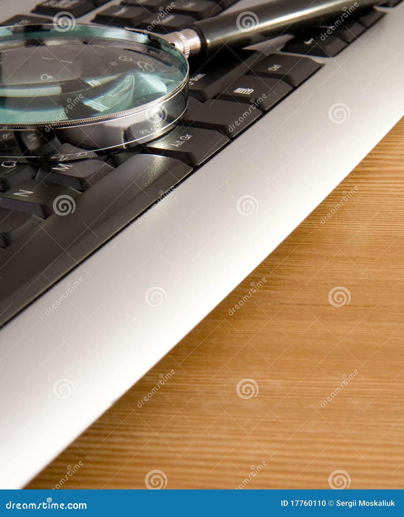 Computer Keyboard And Magnifying Glass Stock Photo - Image of notebook ...