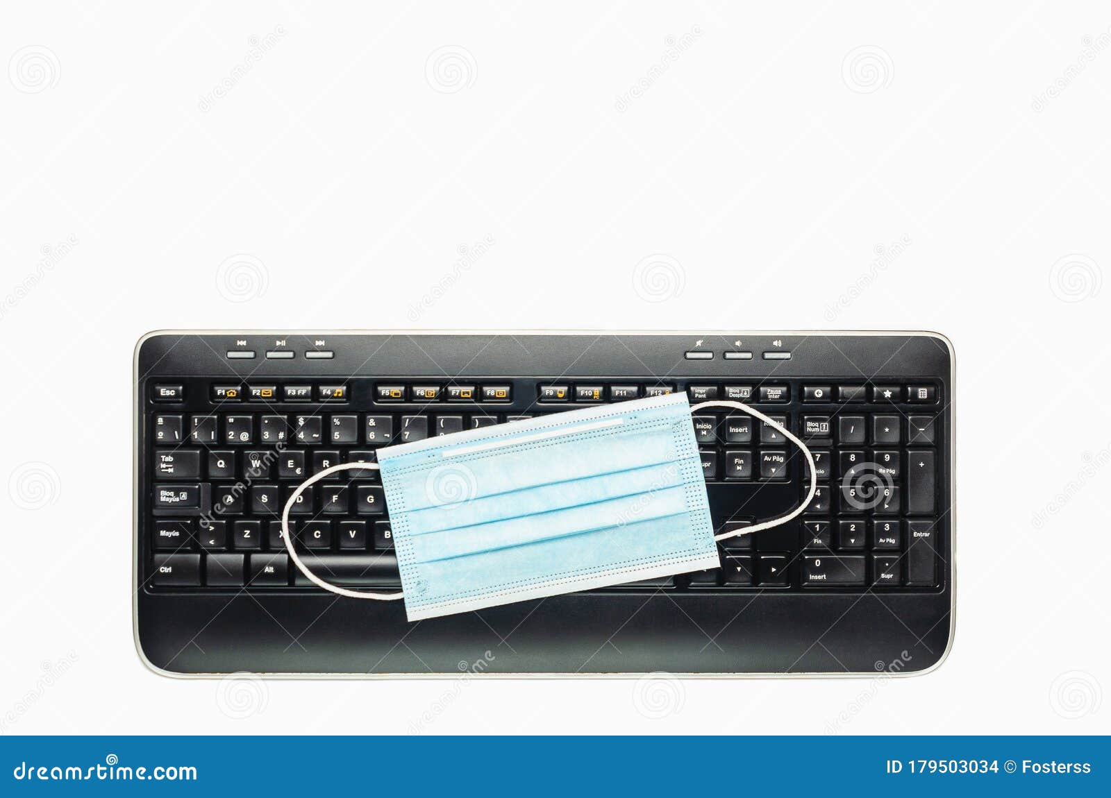 Computer Keyboard with a Medical Mask on it. Top View with Space for ...
