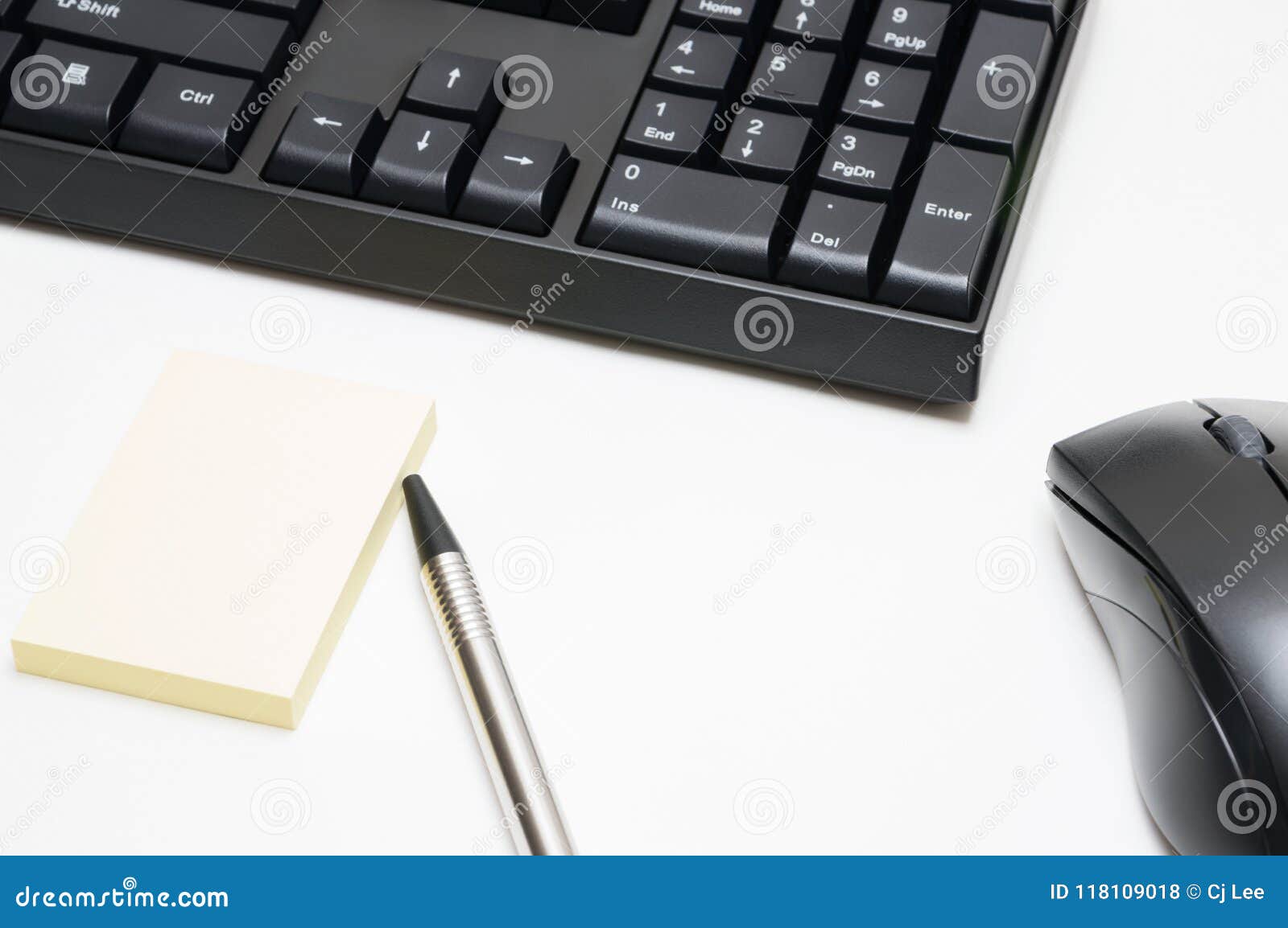 Computer Keyboard and Mouse, Pen, Yellow Sticky Note on Stock Photo ...