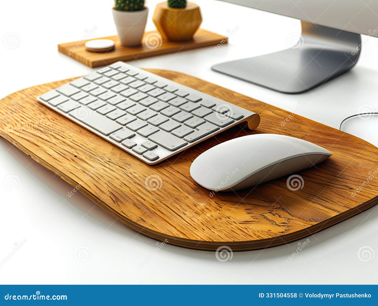 A Computer Keyboard and Mouse Sitting on Top of a Wooden Desk Stock ...