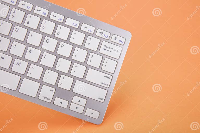 Computer Keyboard on Orange Background Stock Image - Image of ...
