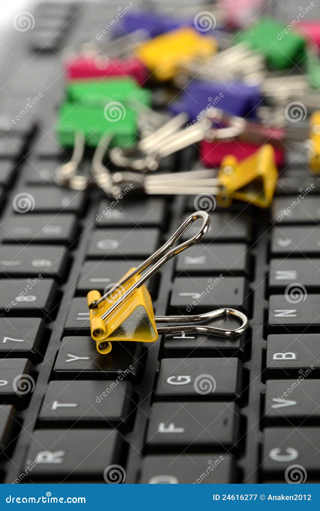 Computer Keyboard and Paper Clip Stock Image - Image of yellow ...