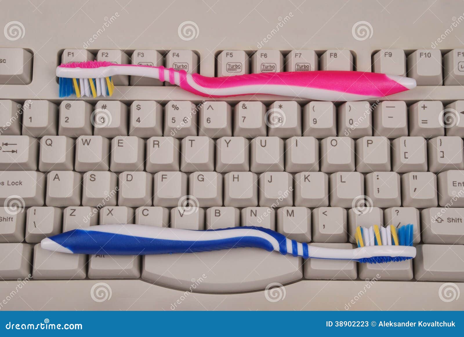 Computer Keyboard and Toothbrushes. Stock Image - Image of closeup ...