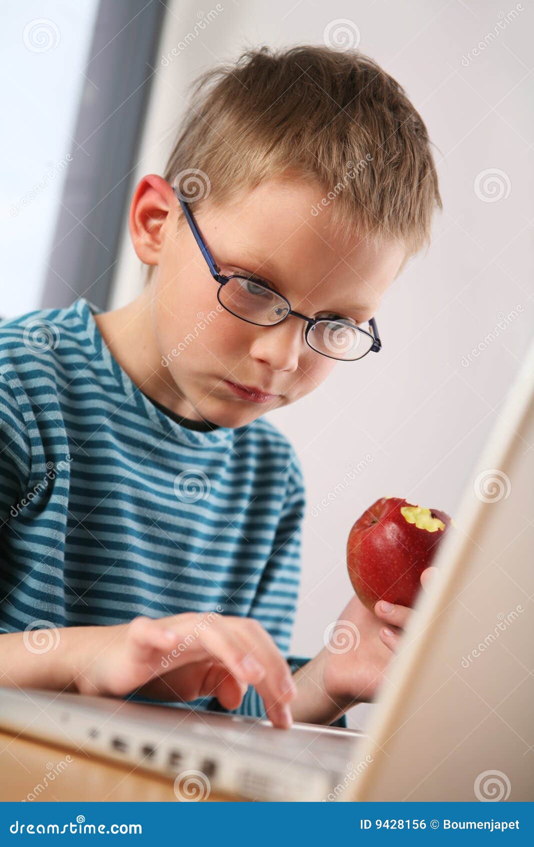 Computer kid. Eating apple stock photo. Image of computer - 9428156