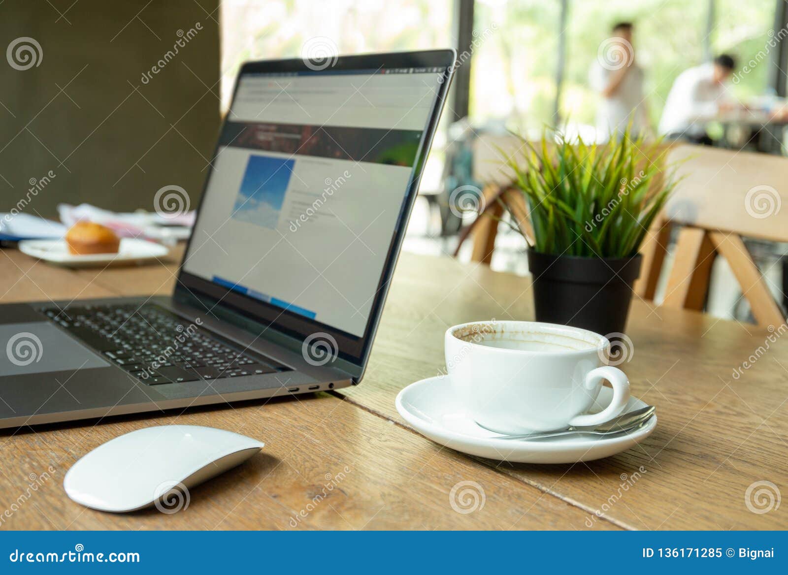 Computer Laptop with Mouse and Coffee Cup on Table in Coffe Shop. Stock ...