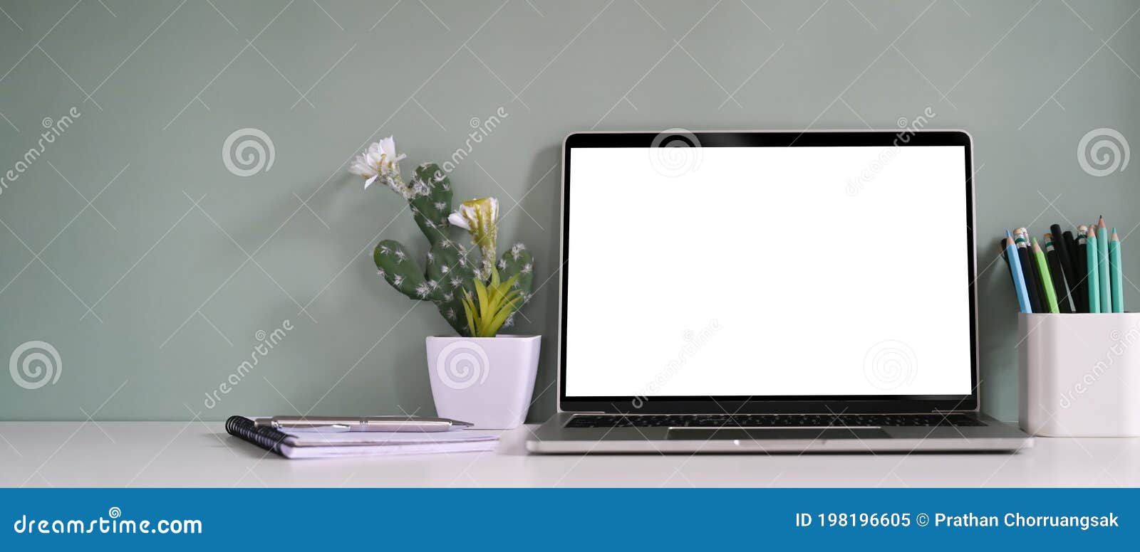 Computer Laptop with a White Blank Screen is Putting on a Working Desk ...