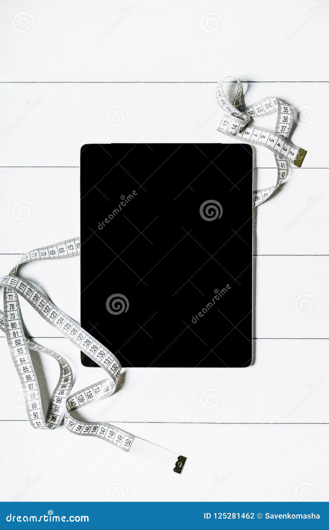 Computer with a Measuring Tape on White Wooden Vintage Background Top ...