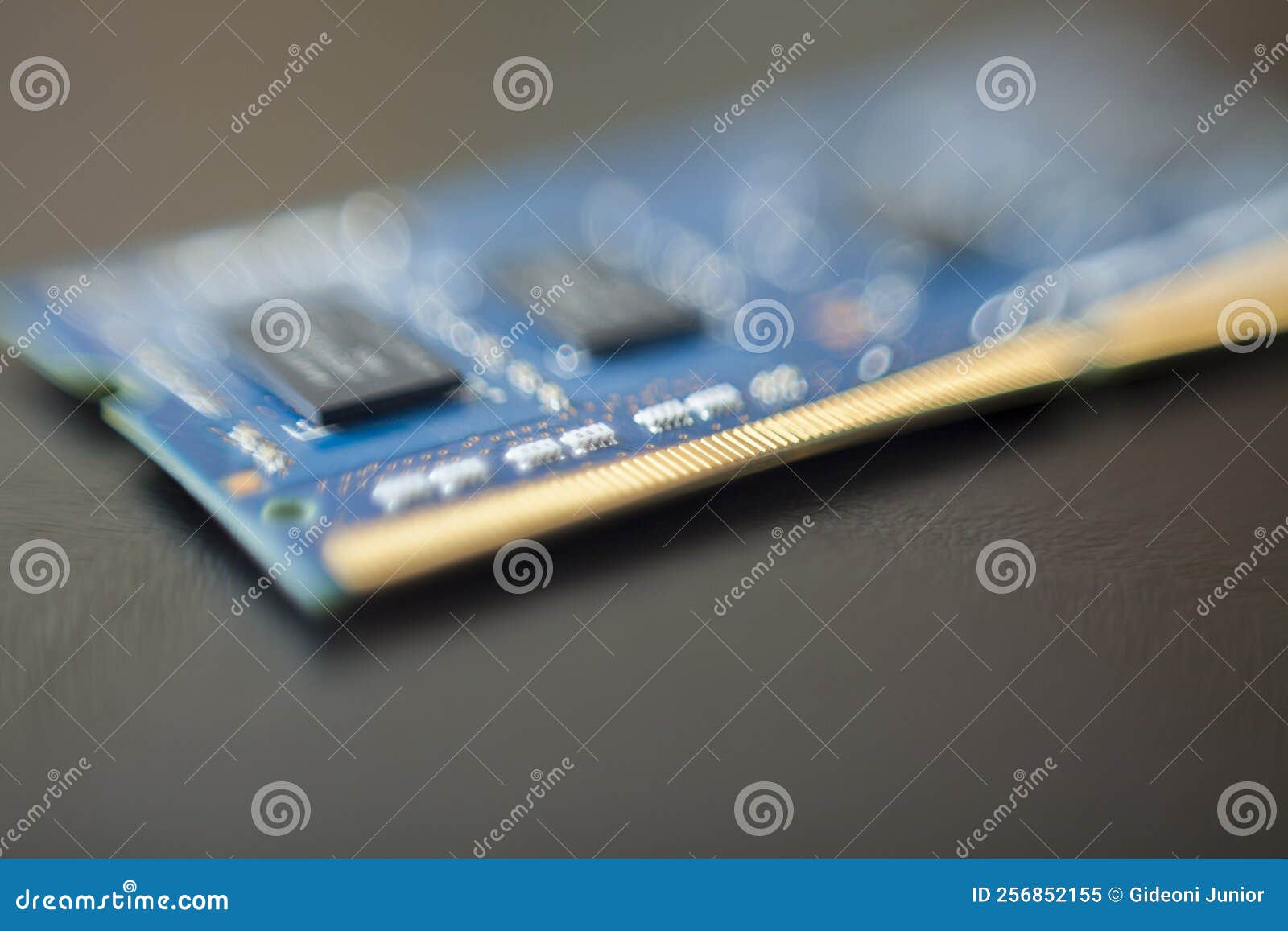 Computer Memory Chip Placed on Top of a Black Table. Connections and ...