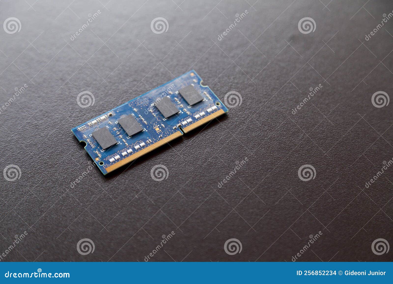 Computer Memory Chip Placed on Top of a Black Table. Connections and ...