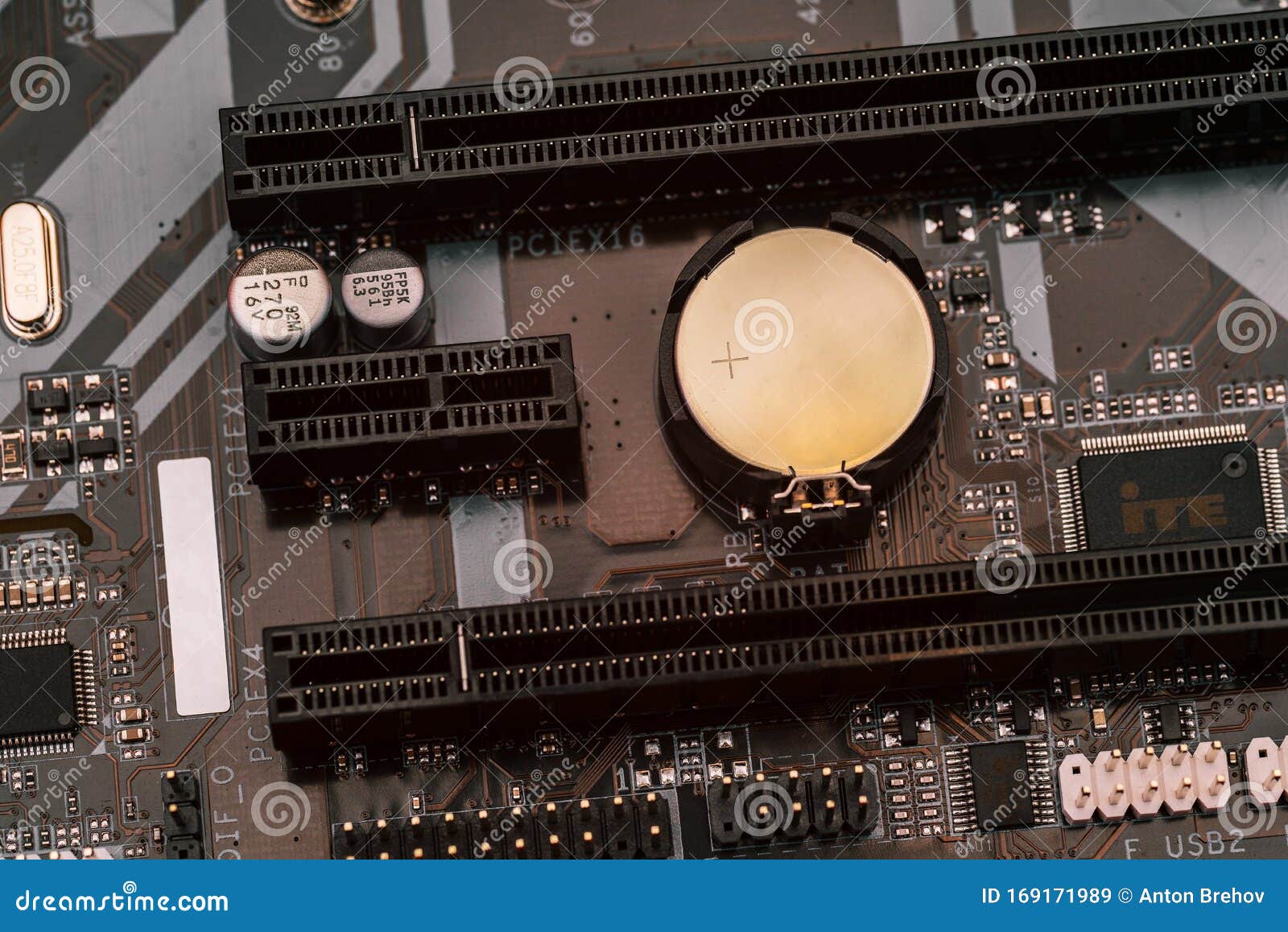 Computer Motherboard. Empty Slots for RAM. Computer Battery Editorial ...