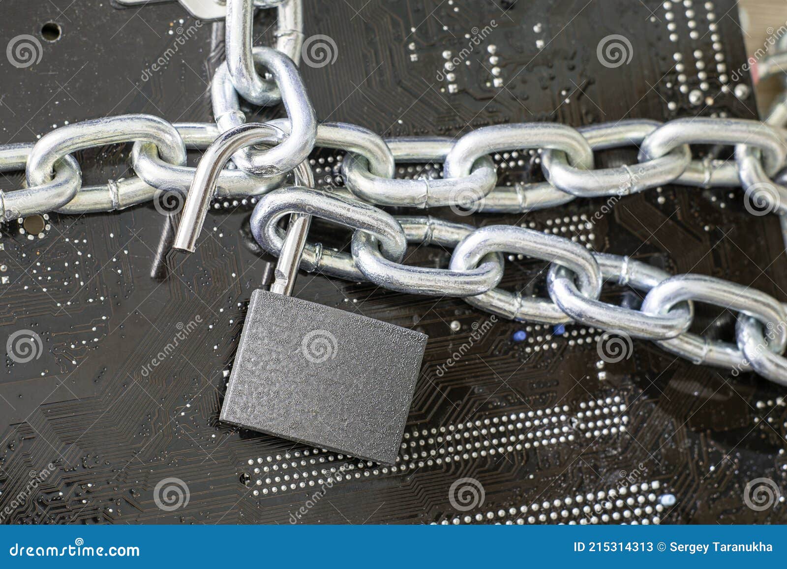 The Computer Motherboard is Wrapped with an Iron Chain the Lock on the ...