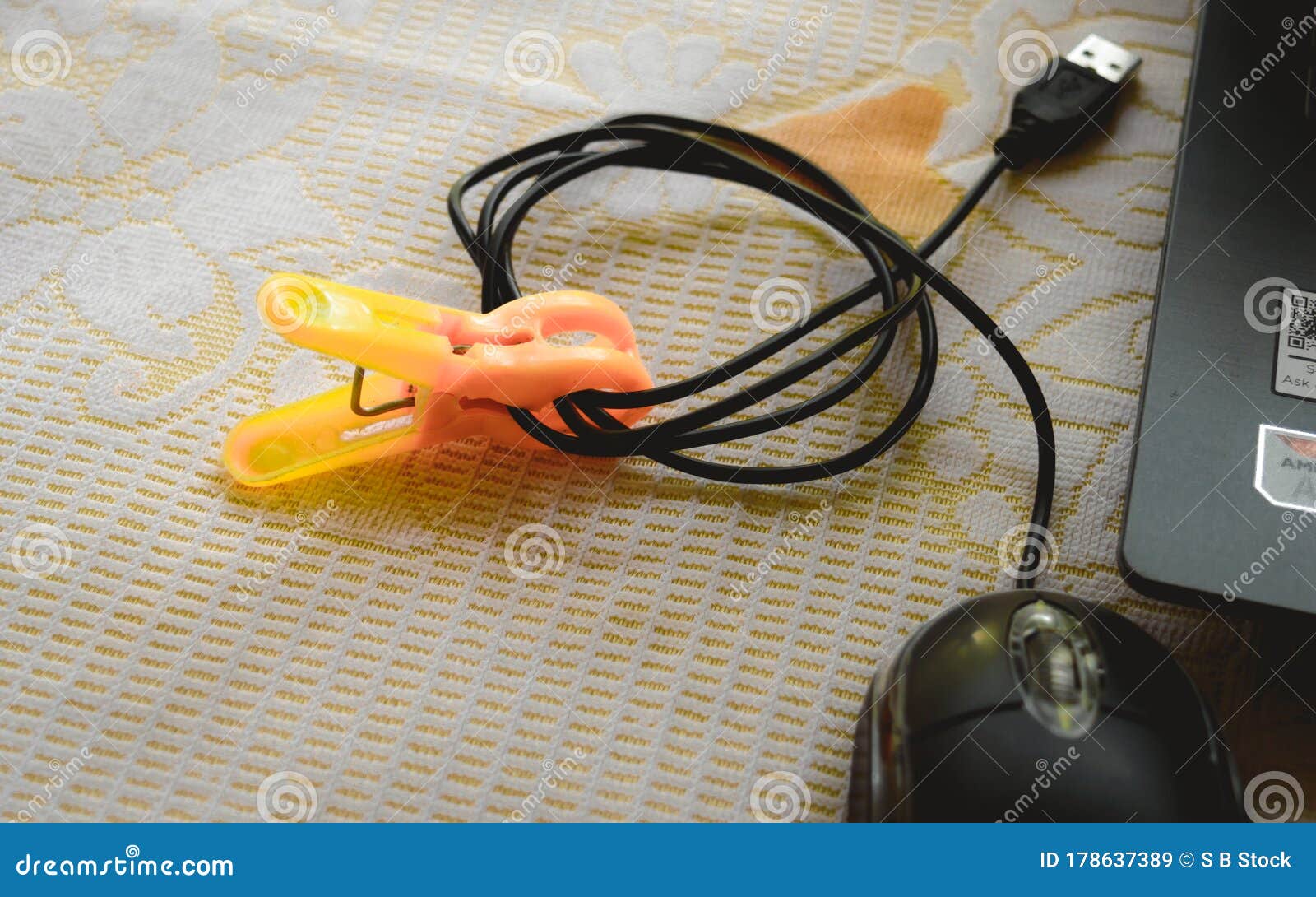 Computer Mouse Connection Plug-in Rolled and Clipped and Placed in ...