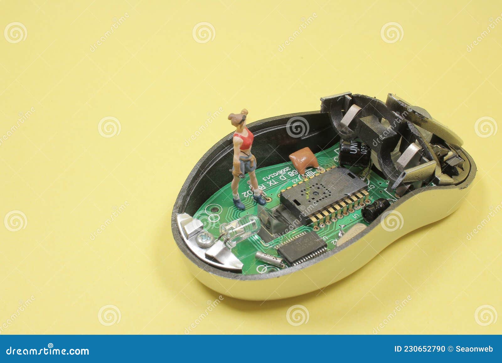 Computer Mouse Cracked Isolated with the Engineer Figure Stock Photo ...