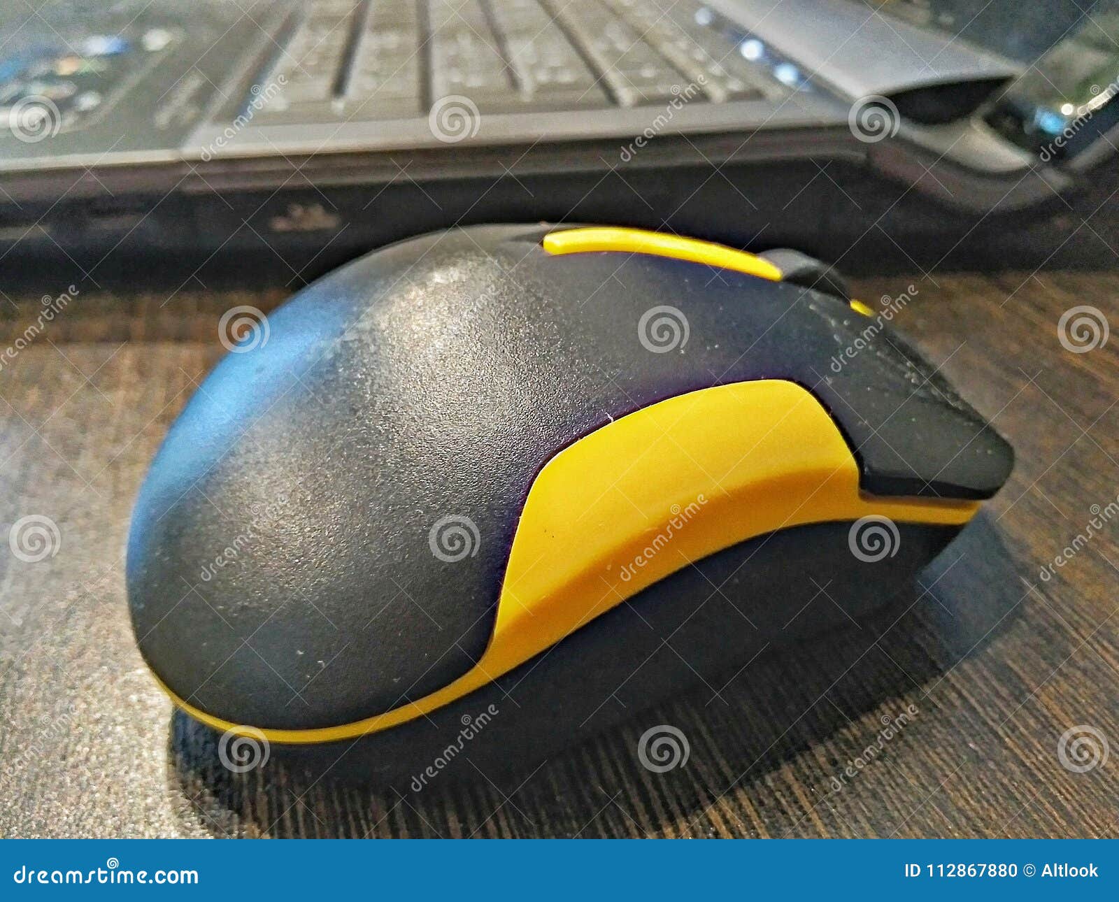 Computer Mouse on the Desk Next To the Laptop Stock Photo - Image of ...