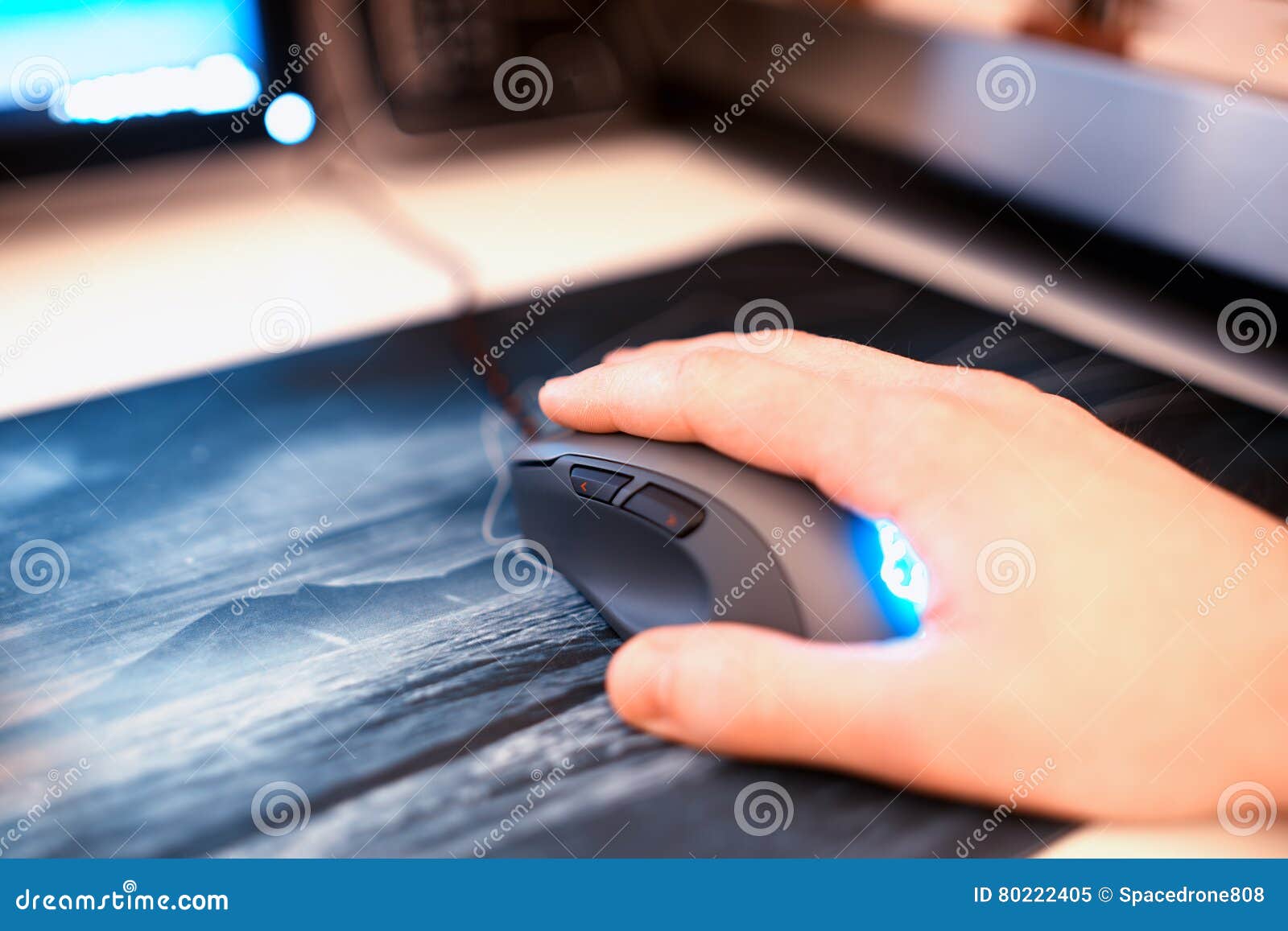 Computer Mouse with Human Hand on Mousepad Bokeh Backdrop Stock Image ...