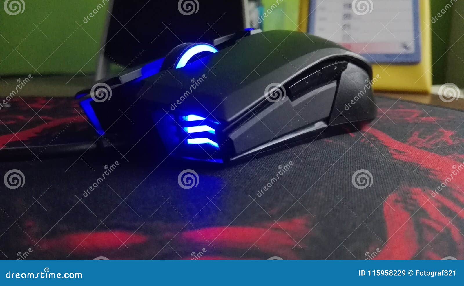 Blue lightened up mouse stock image. Image of blue, computer - 115958229