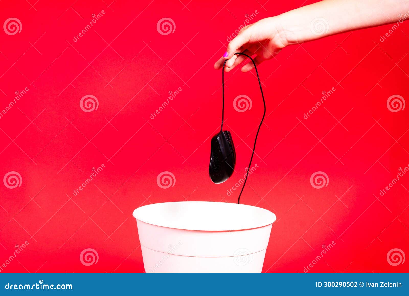 A Computer Mouse with a Wire is Thrown into the Office Wastebasket ...