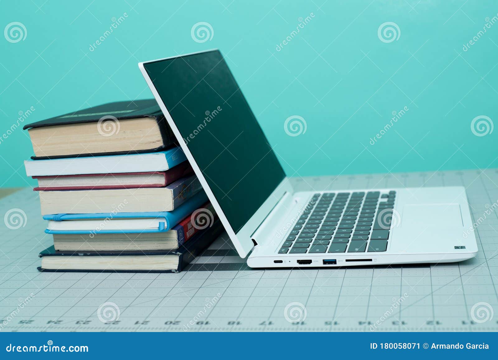 Computer with Books on a Table Station Stock Image - Image of books ...