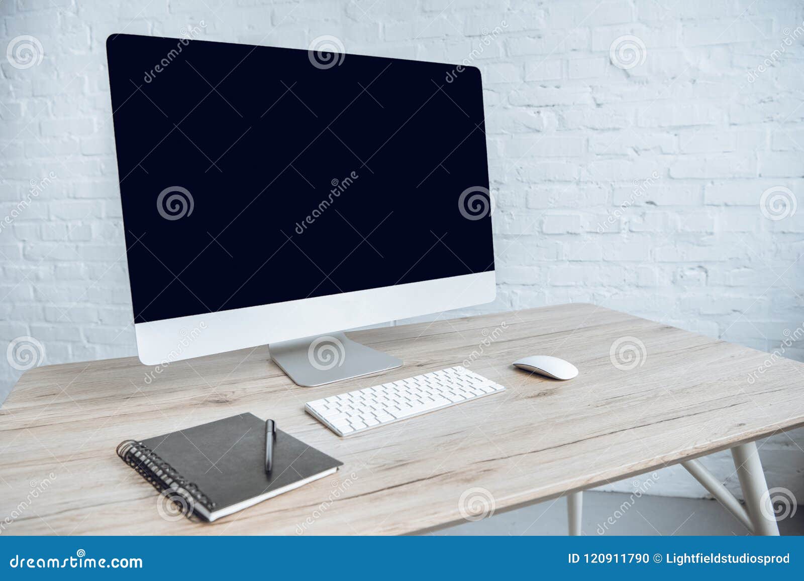 Computer with Notebook on Table Stock Photo - Image of remote, mouse ...