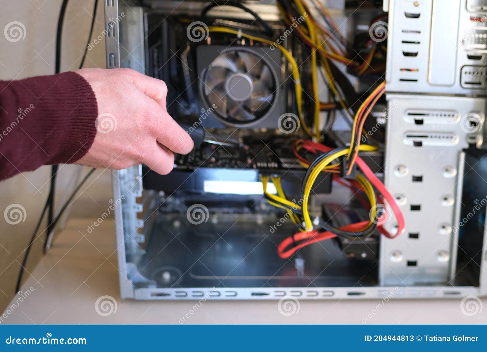 Computer Parts in an Open Case, Colored Wires and Metal Boards, the ...
