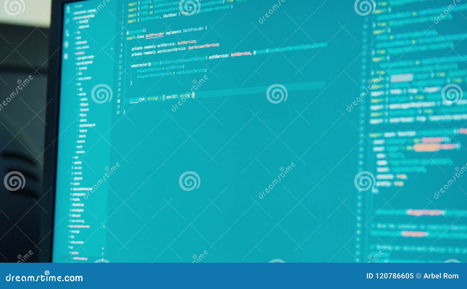 Computer Programmer Sitting in Front of a Screen Coding Software Stock ...