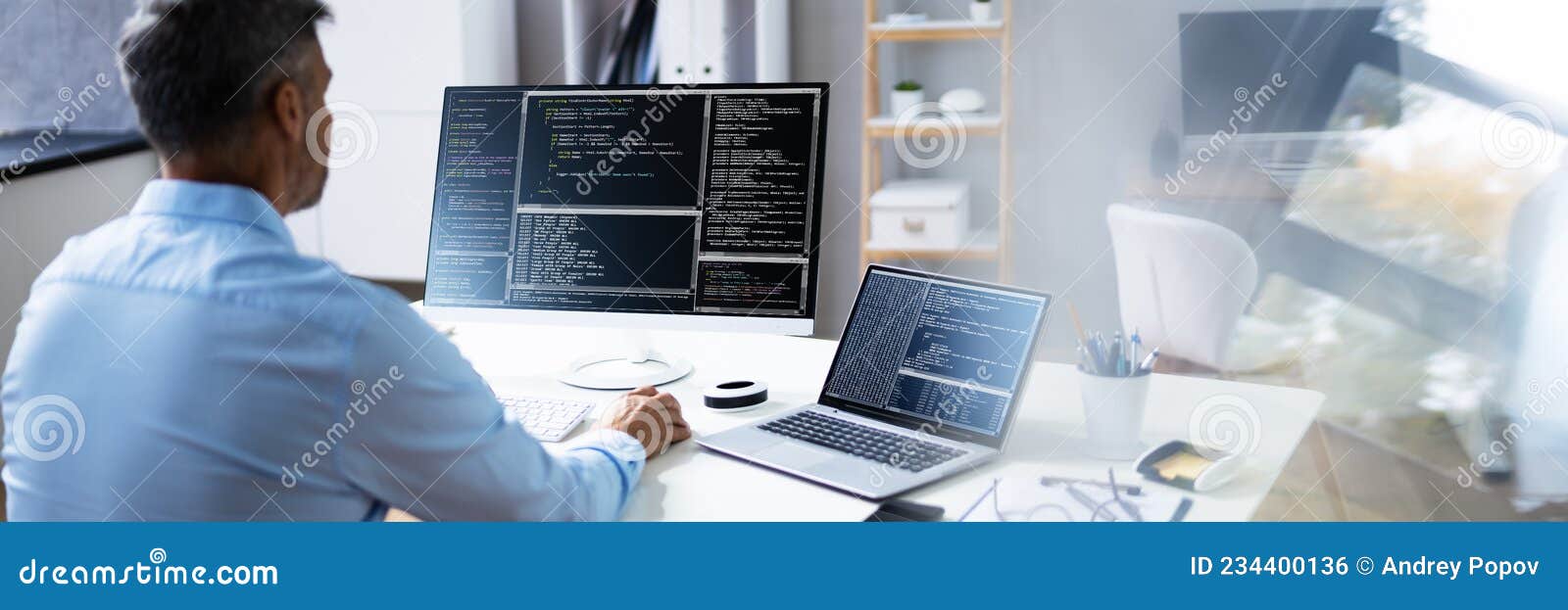 Computer Programmer Writing Program Code on Computer Stock Photo ...