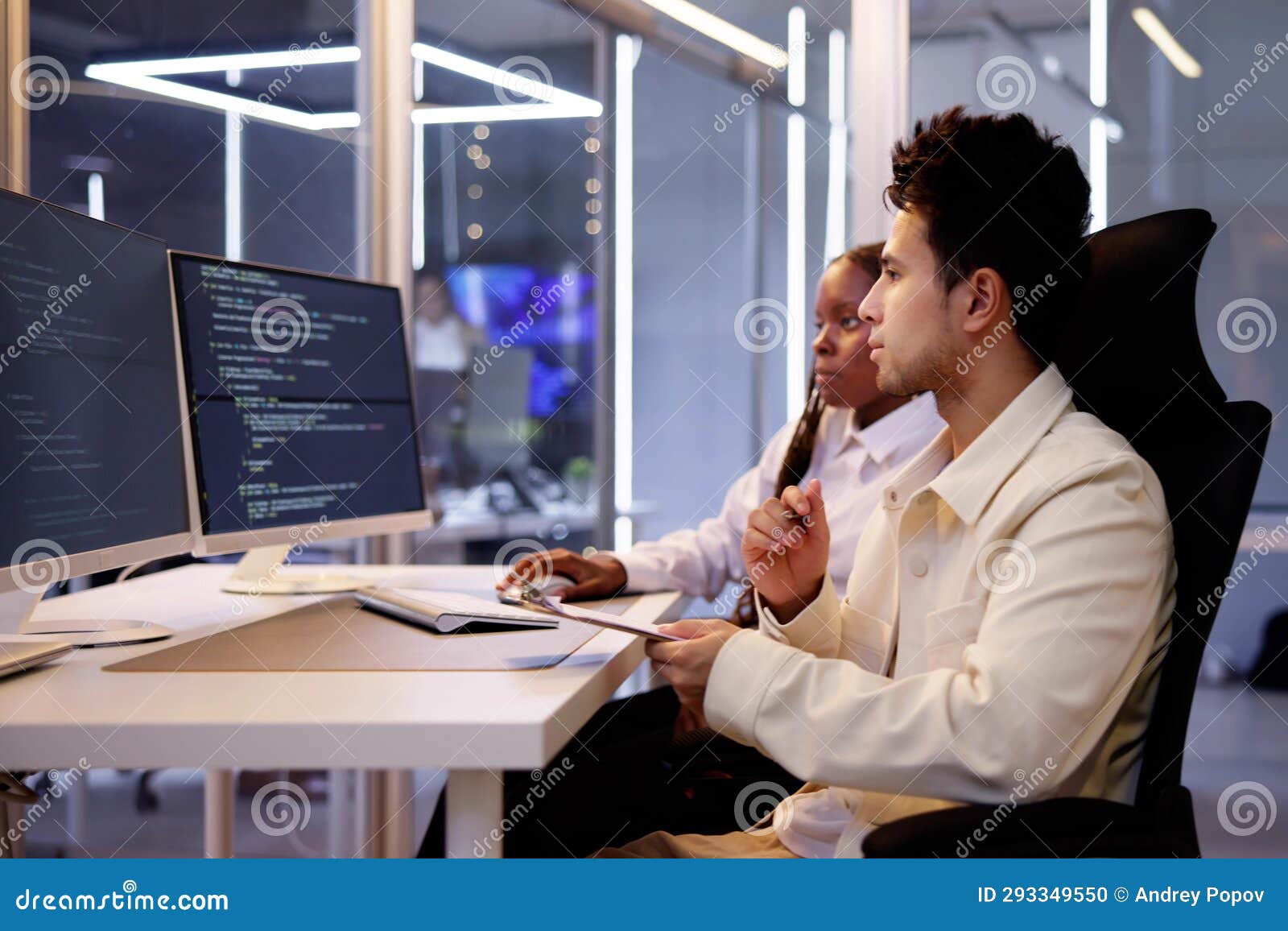 Computer Programmer Writing Program Code on Computer Stock Photo ...