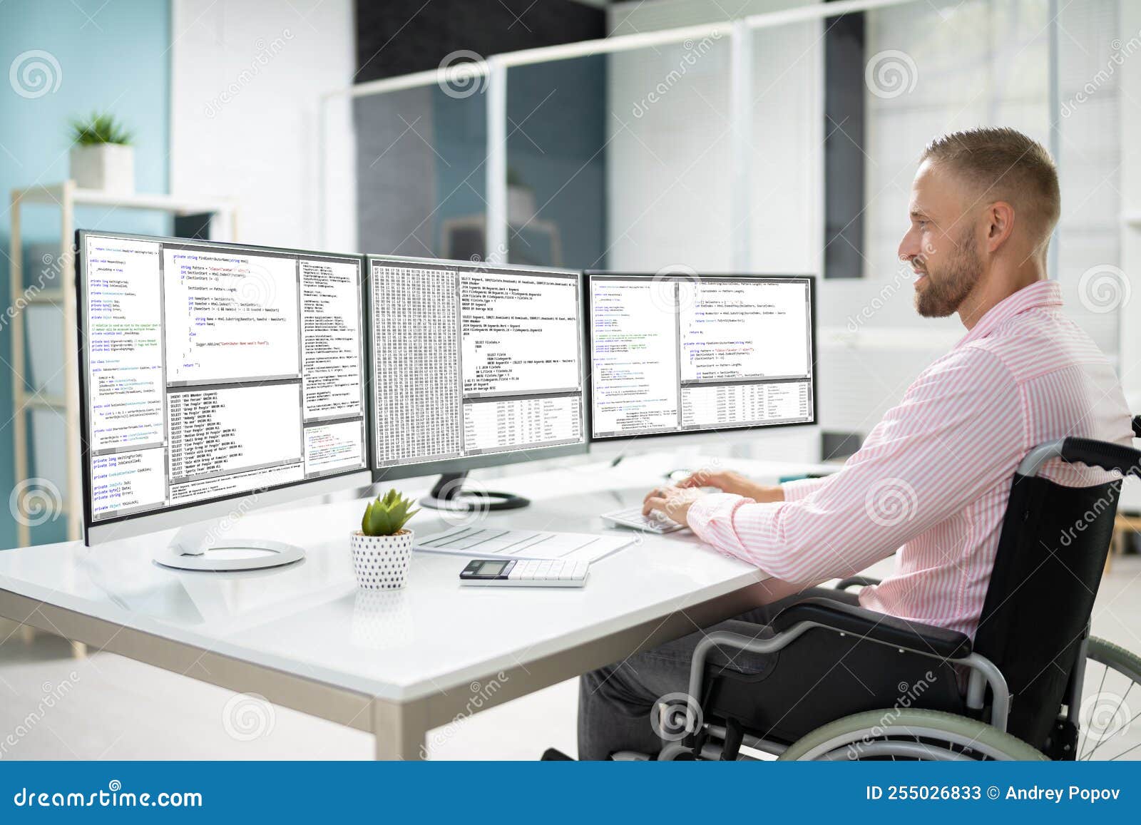 Computer Programmer Writing Program Code On Computer Stock Image