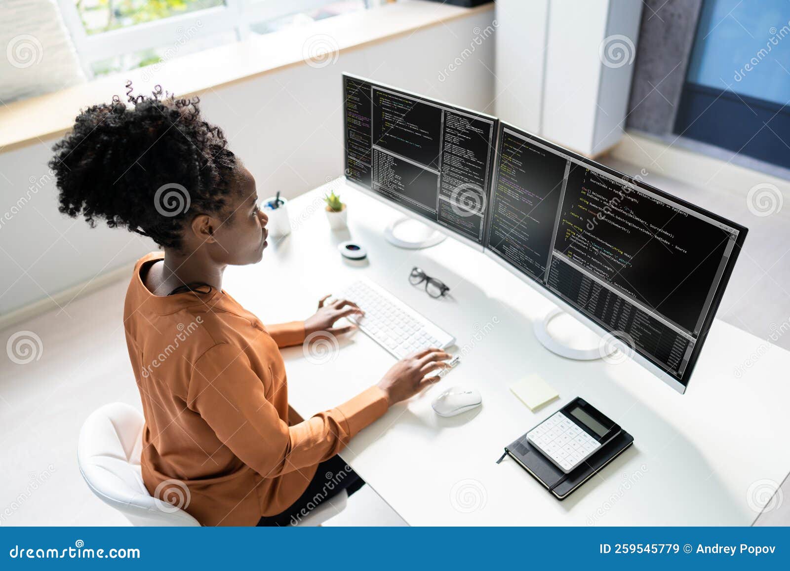 Computer Programmer Writing Program Code On Computer Stock Image
