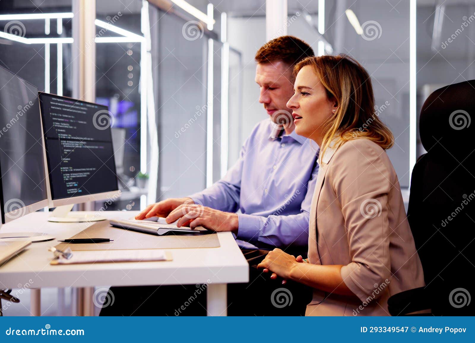 Computer Programmer Writing Program Code On Computer Stock Image
