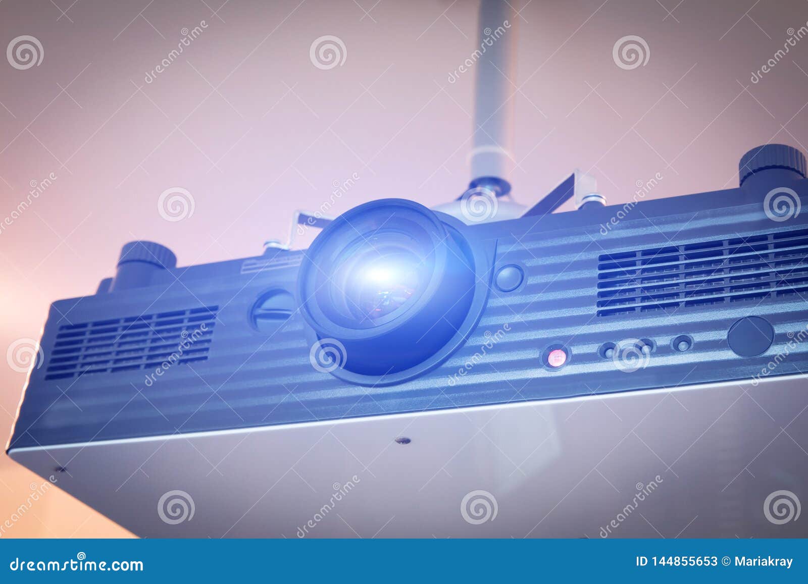 Computer Projector Wih Blue Light Flare Anging In Conference Hall ...