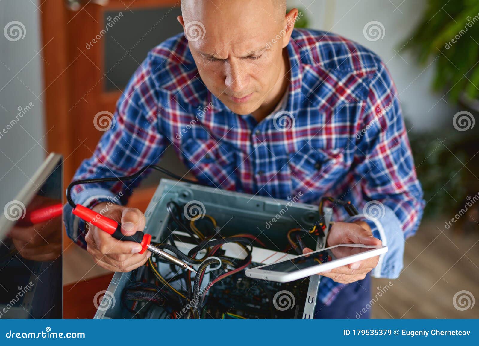 Man repairing computer stock image. Image of device - 179535379