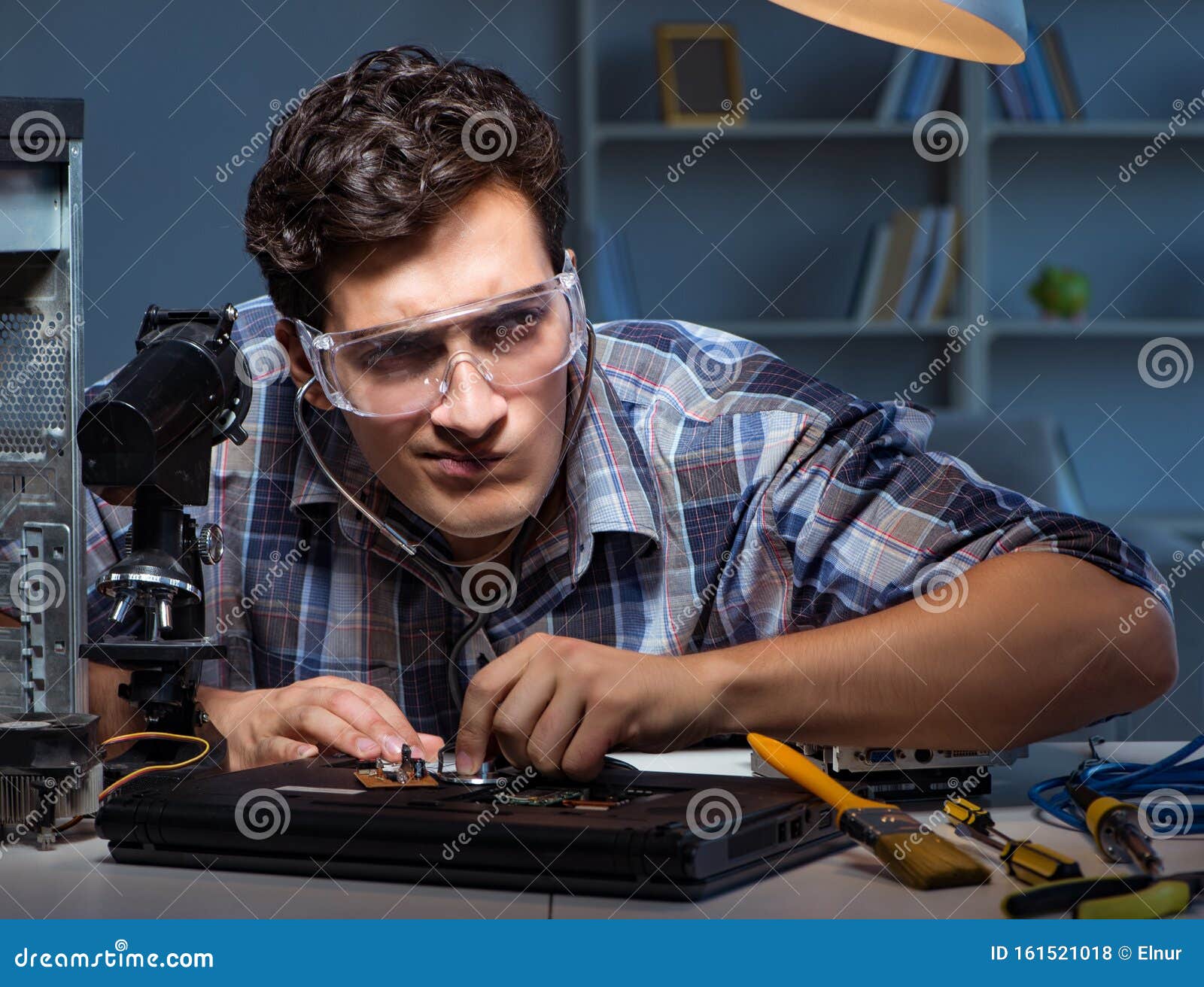 Computer Repair Concept with Man Inspecting with Stethoscope Stock ...