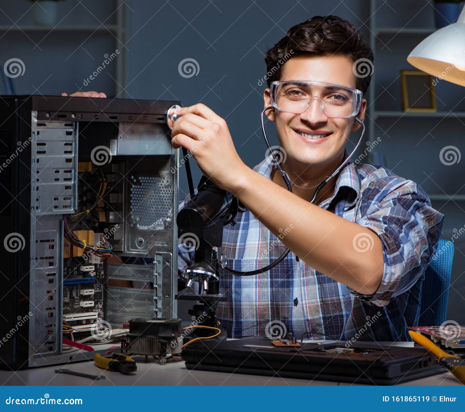 The Computer Repair Concept with Man Inspecting with Stethoscope Stock ...