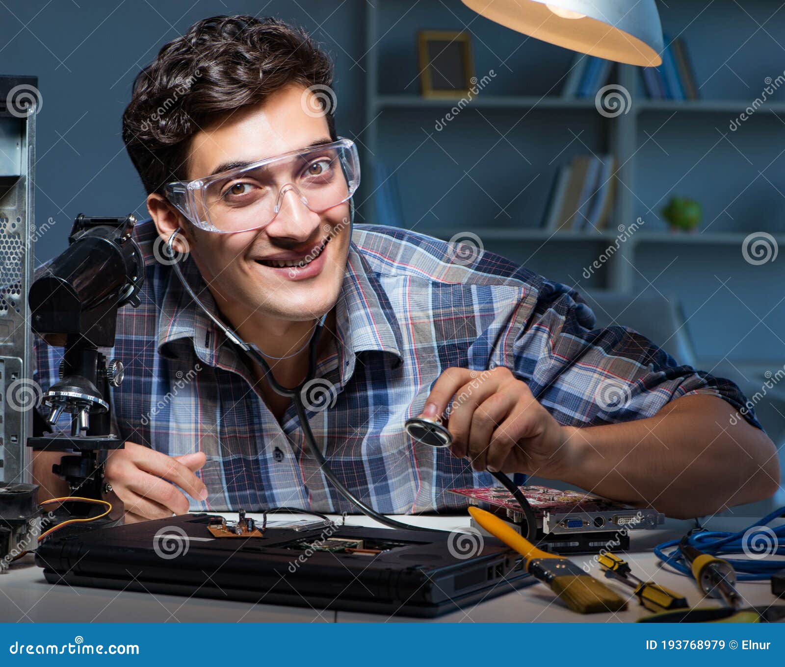 Computer Repair Concept with Man Inspecting with Stethoscope Stock ...