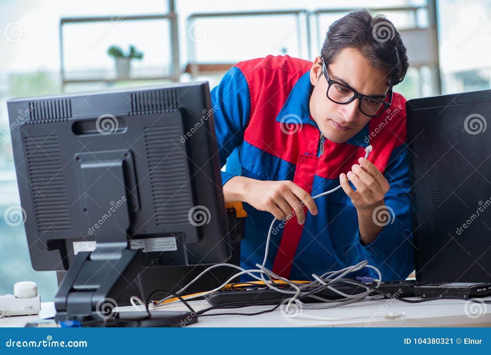 The Computer Repairman Working on Repairing Computer in it Workshop ...