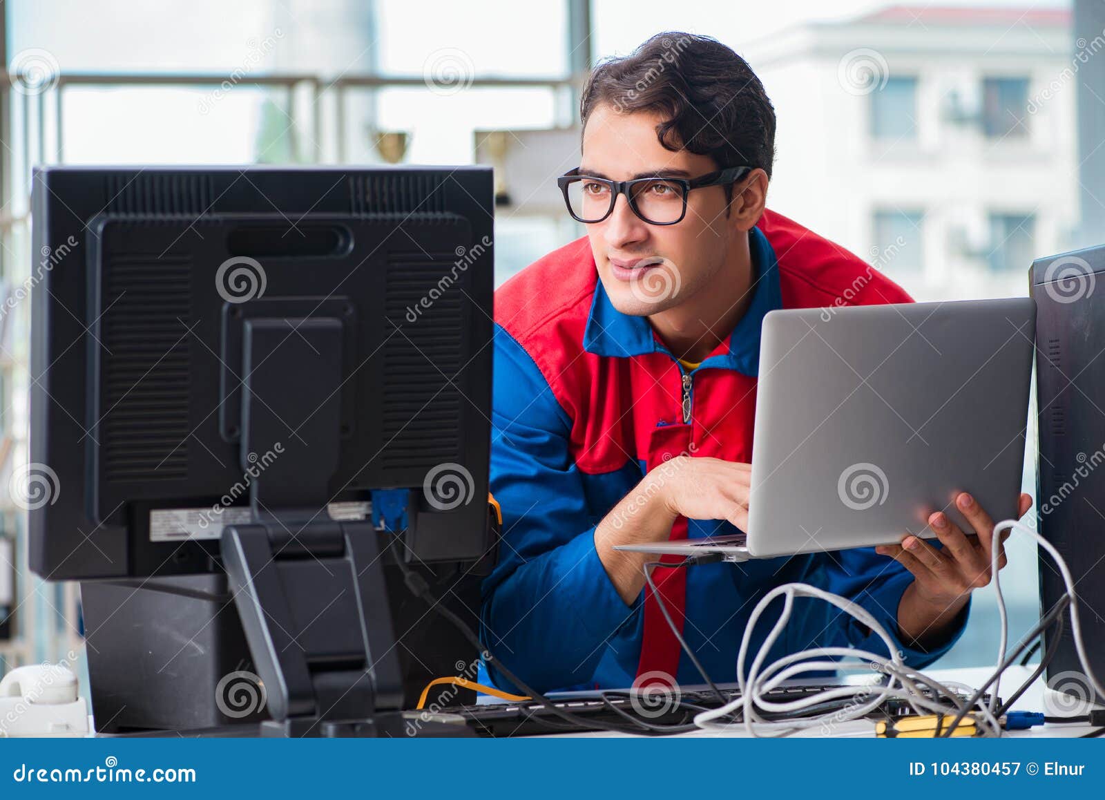 The Computer Repairman Working on Repairing Computer in it Workshop ...