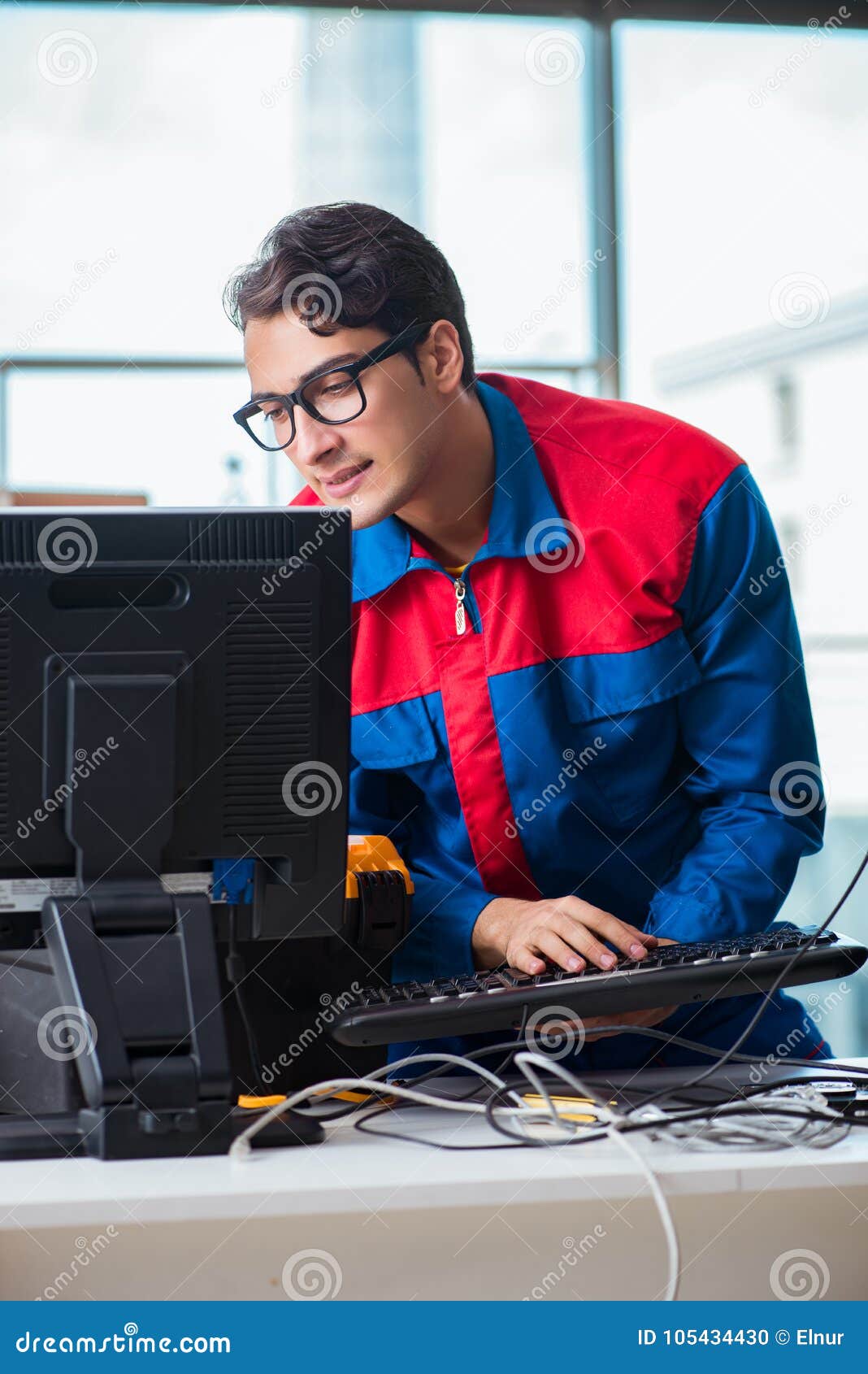 The Computer Repairman Working on Repairing Computer in it Workshop ...