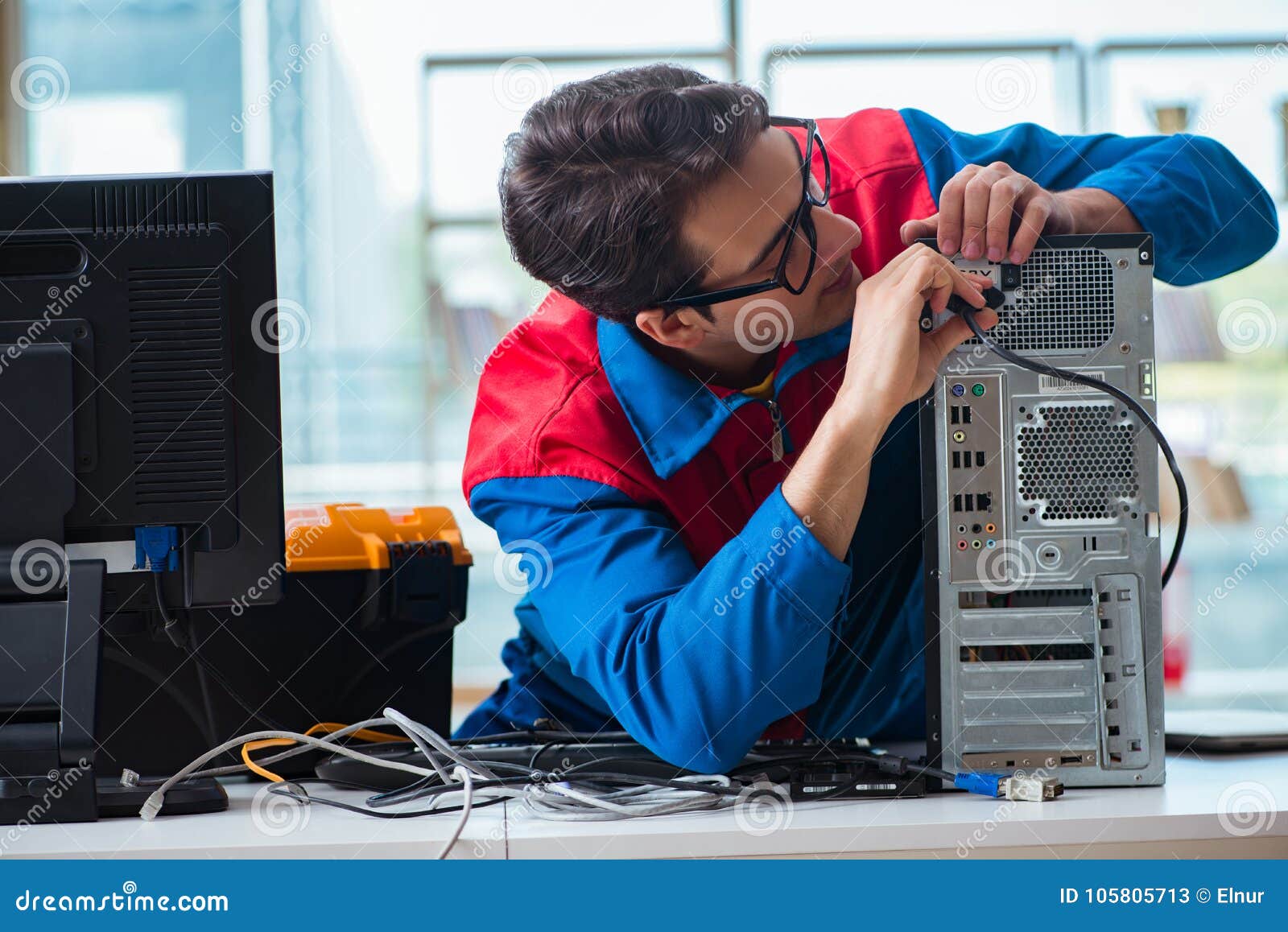 The Computer Repairman Working on Repairing Computer in it Workshop ...