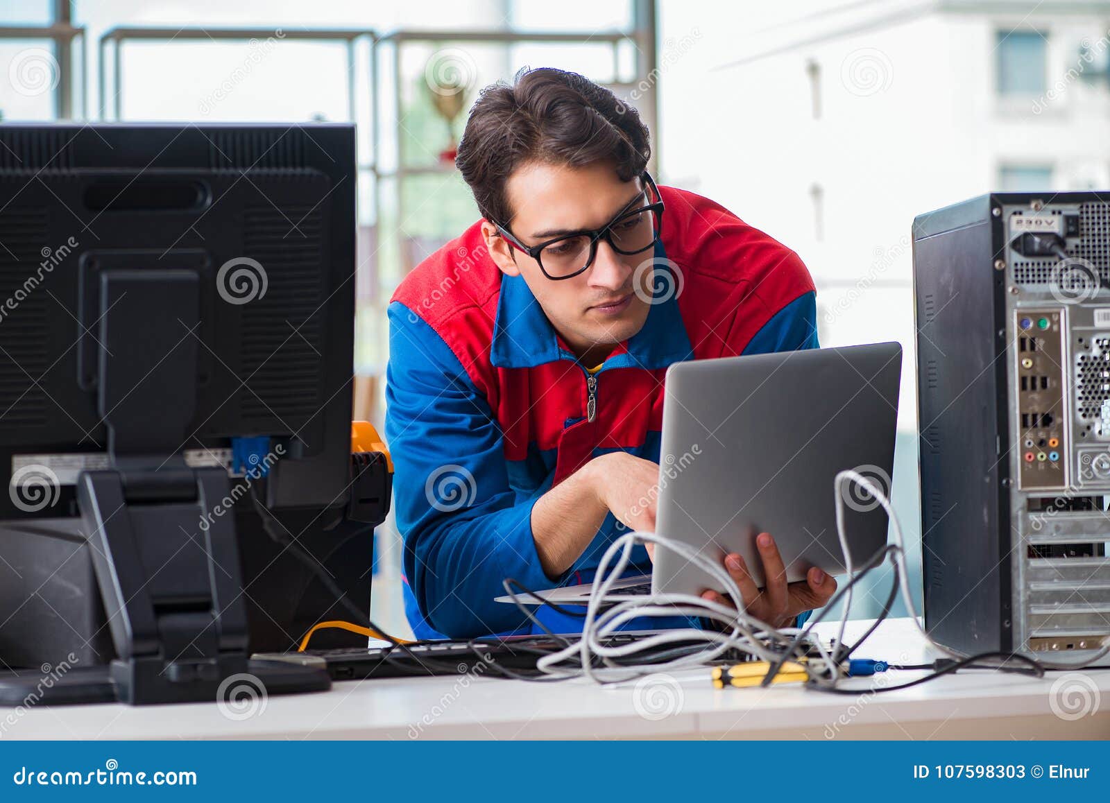 The Computer Repairman Working on Repairing Computer in it Workshop ...