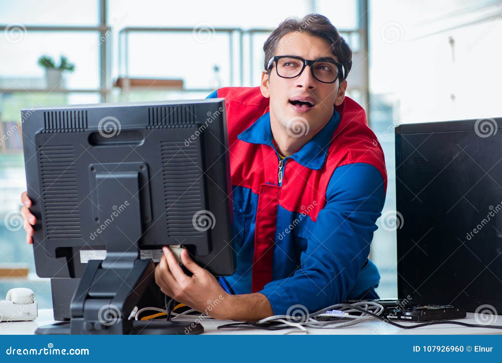 The Computer Repairman Working on Repairing Computer in it Workshop ...