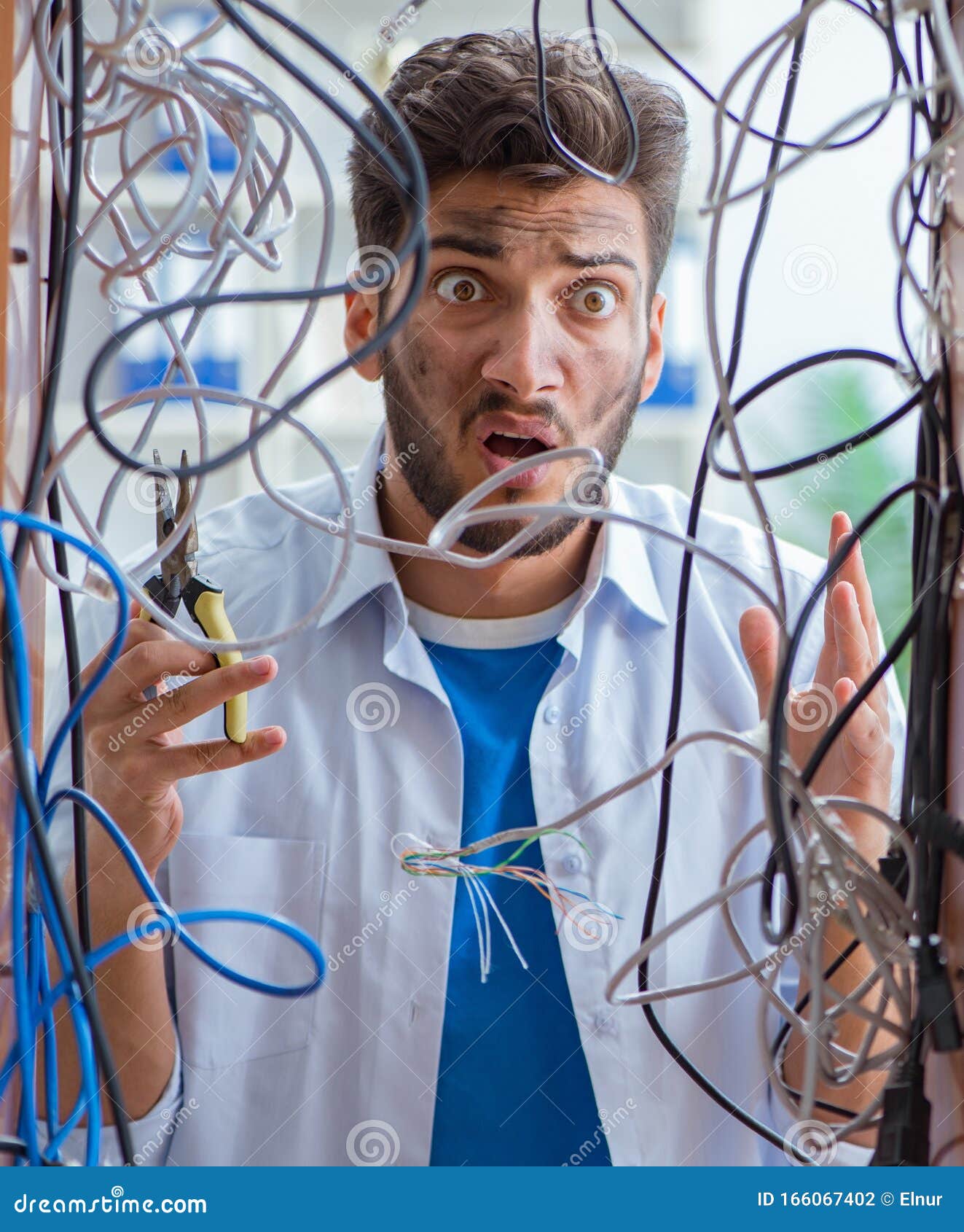 The Computer Repairman Working on Repairing Network in it Worksh Stock ...