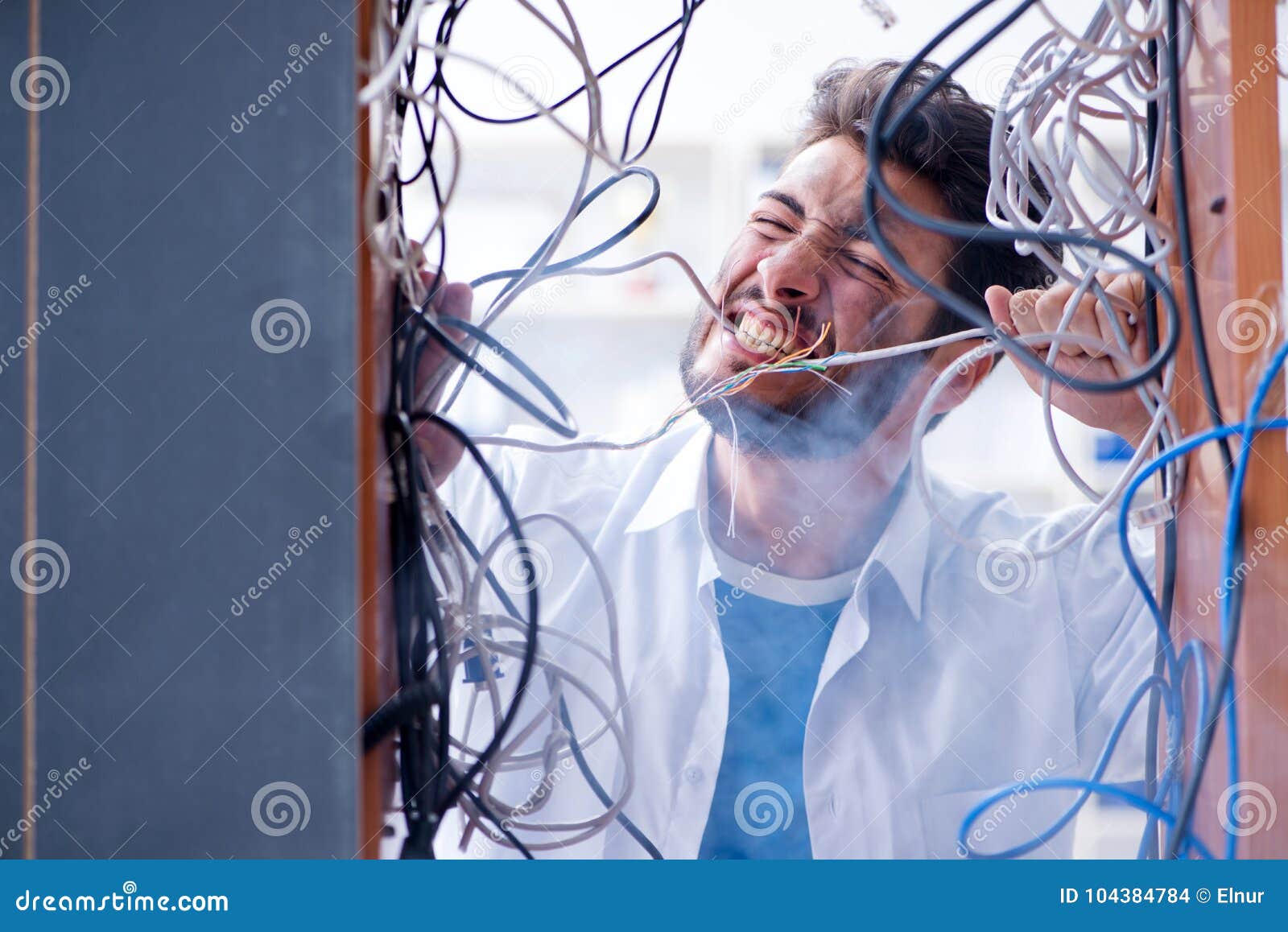 The Computer Repairman Working on Repairing Network in it Workshop ...